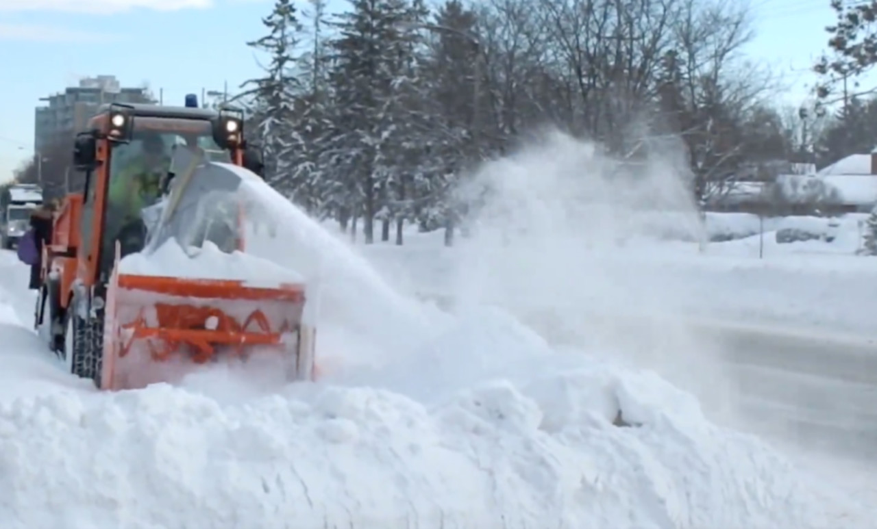 Towering snow piles could get higher as more snow targets Ottawa, Montreal