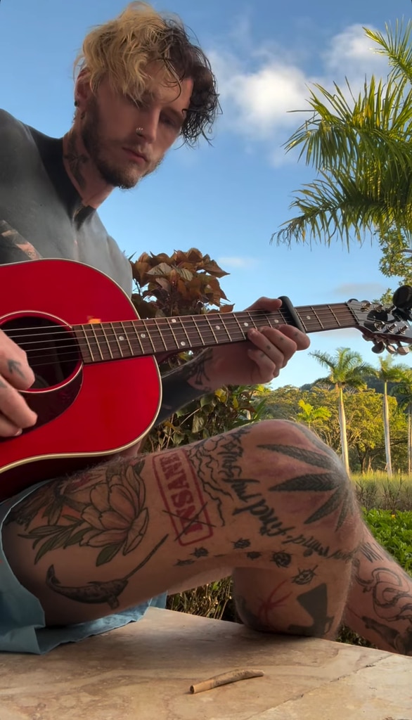 Machine Gun Kelly Reveals New Black-Blonde Split Hairstyle