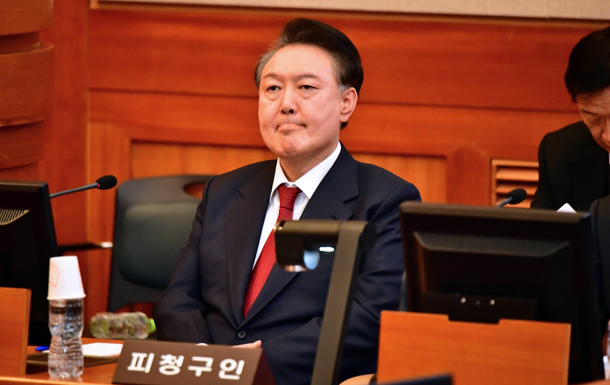 South Korea’s Yoon faces his first day in court