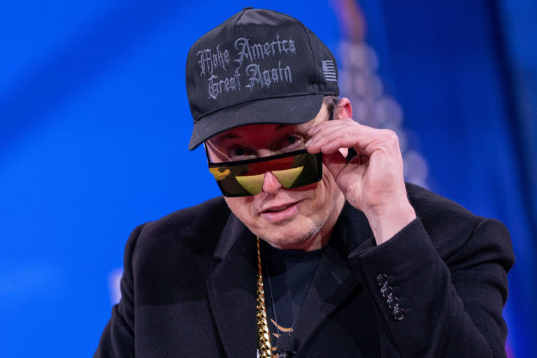 Elon Musk wields chainsaw on stage, says he and Trump are battling 'the ...