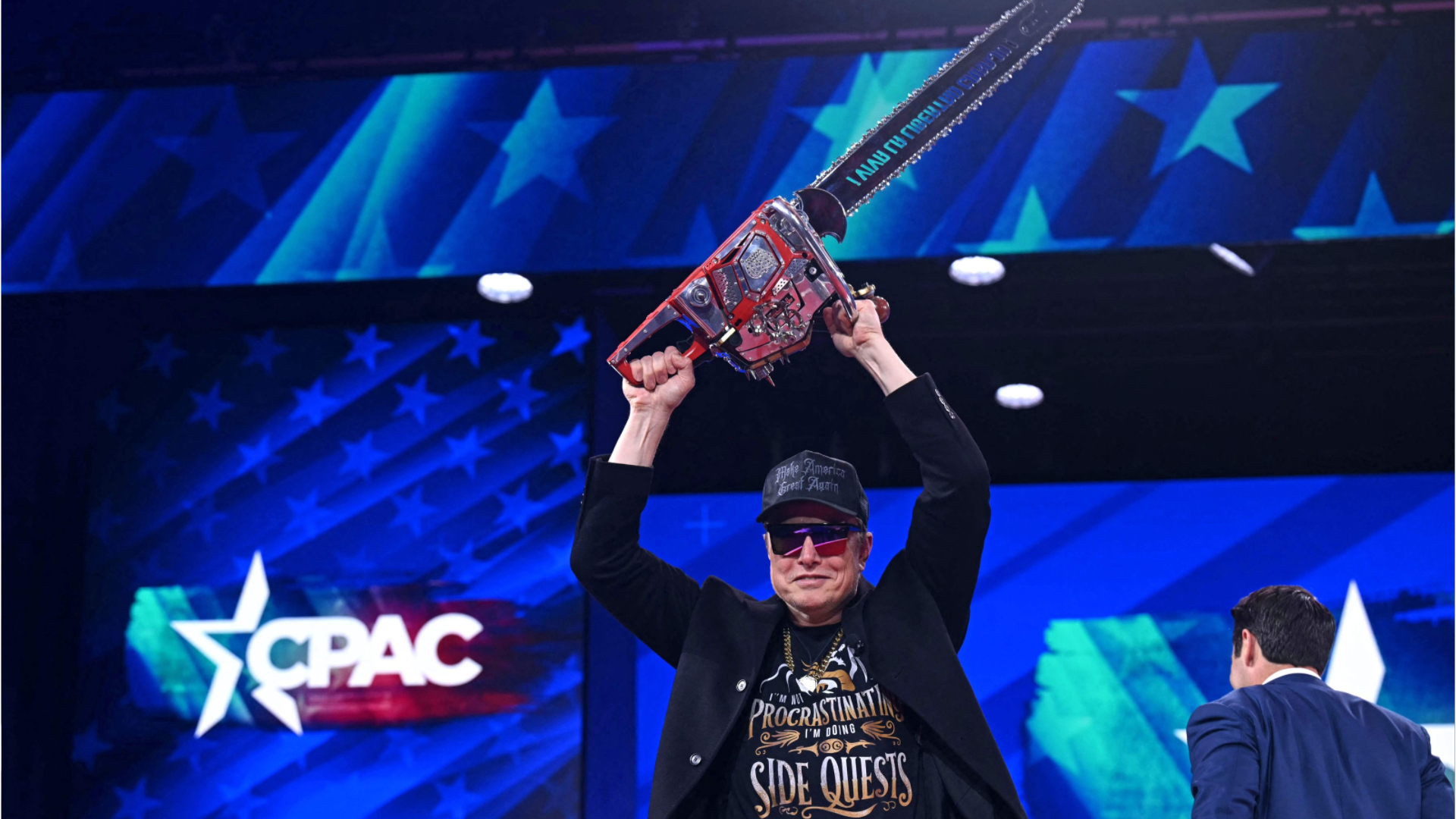 Elon Musk Wields Milei's Chainsaw at Conservative Event, Symbolizing ...