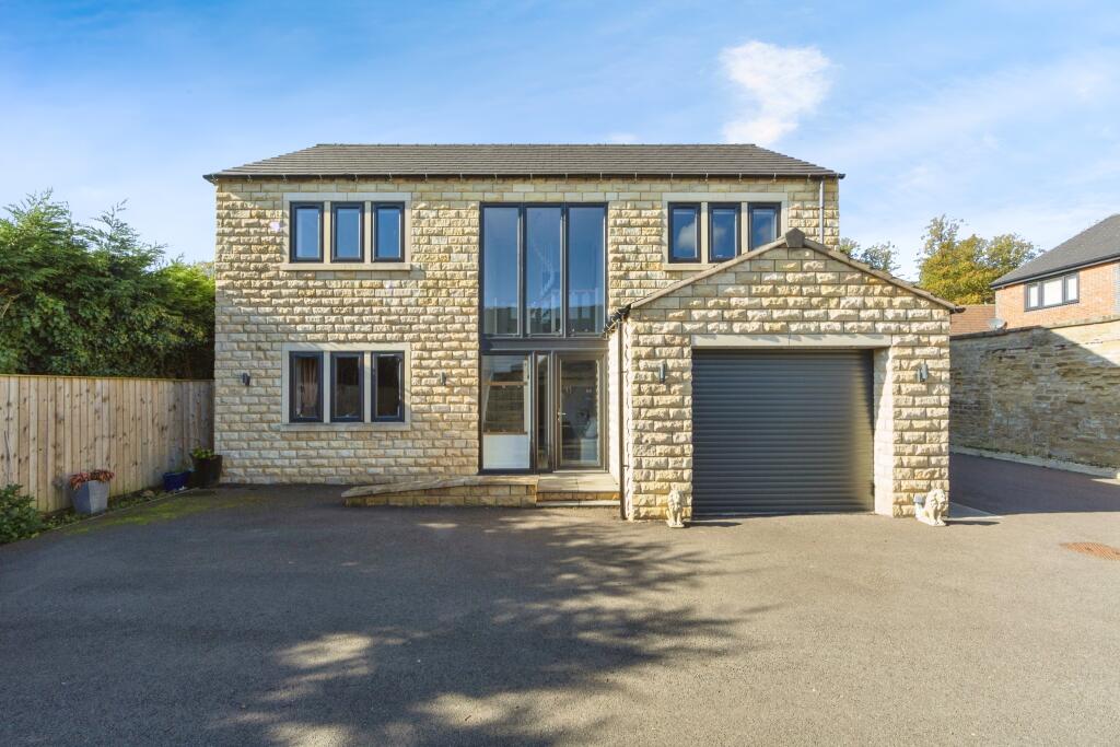 Take a tour of the 'bespoke' and modern Rotherham home with a six car ...