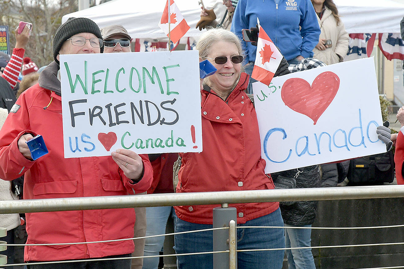 Signs signal support for Canadian travelers