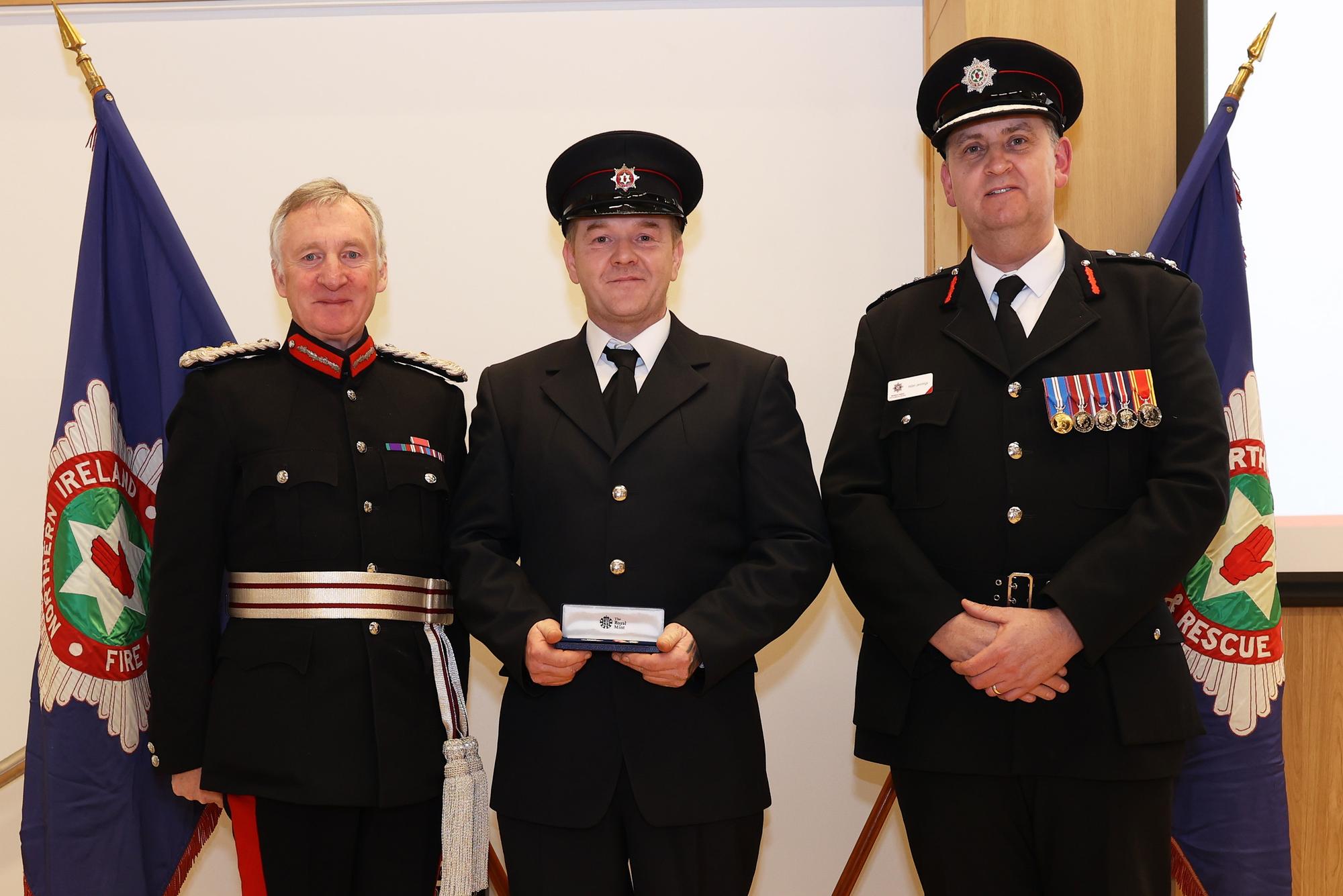 Several Derry firefighters recognised for long service by NI Fire ...
