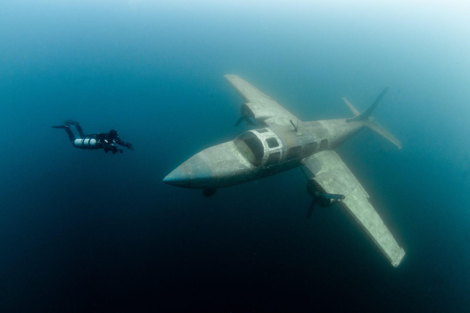 Award-winning underwater photos show haunting wrecks of warships and ...