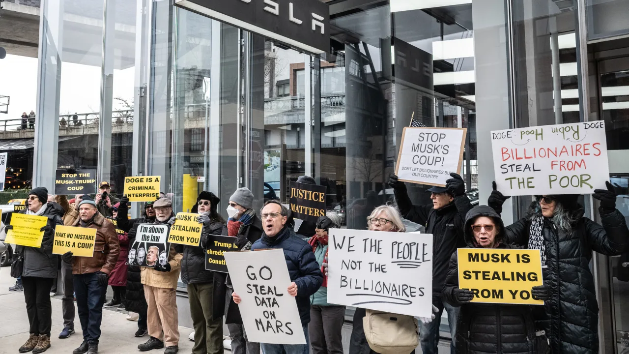 Tesla dealership protests have inspired a new generation of signs