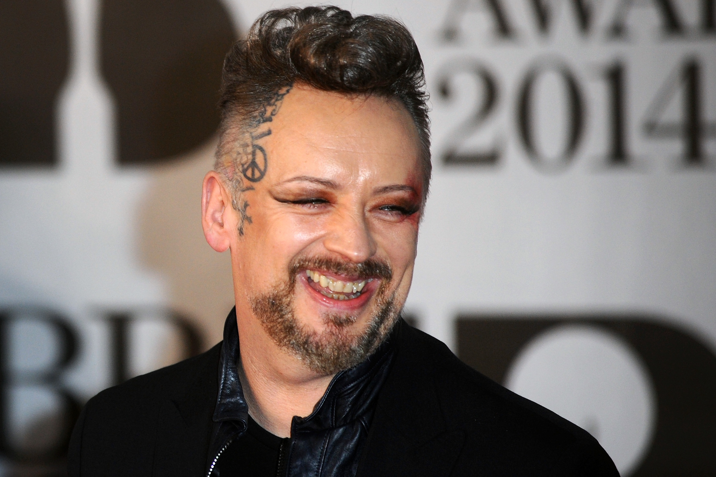 Boy George calls JK Rowling 'bored rich bully' as social media feud ...