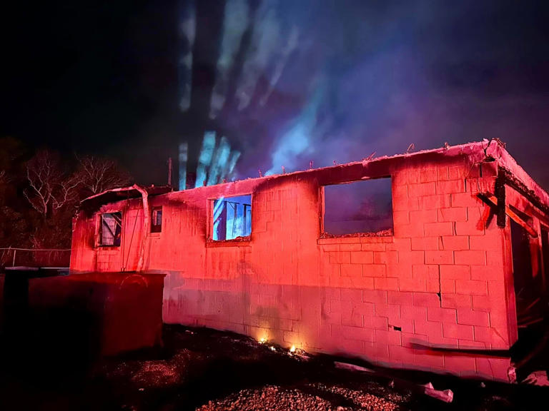A 50' by 30' building burned at a cemetery east of U.S. 1, north of ...