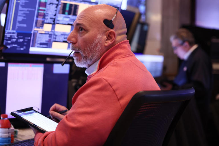 Dow dives more than 700 points as latest data raise alarms about ...