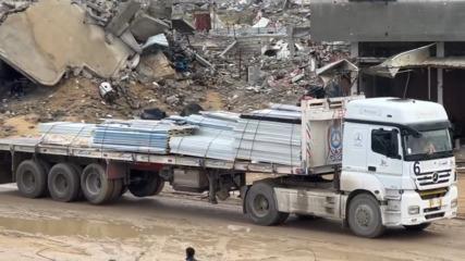 Trucks carrying building structures seen in Rafah