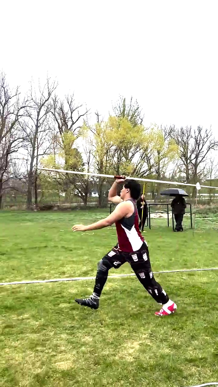 Athlete Loses Footing While Attempting Javelin Throw