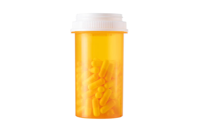 Why are pill bottles orange?