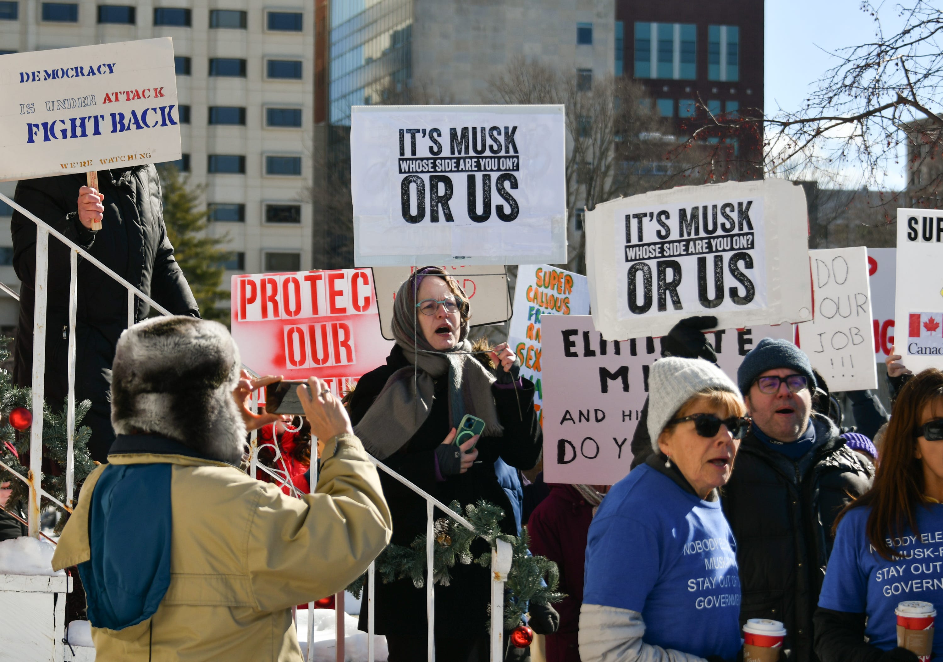 Protesters picket Congressman Tom Barrett's Lansing office over Trump ...