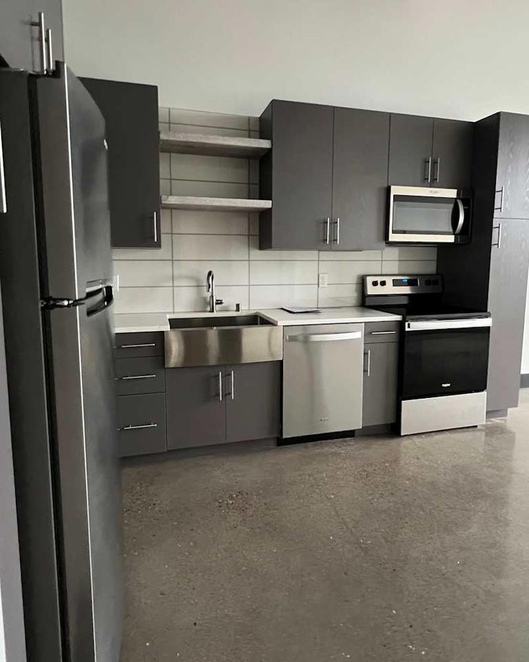 A $200 DIY Project Adds Tons of Function to This Gray "Blank Slate" Kitchen