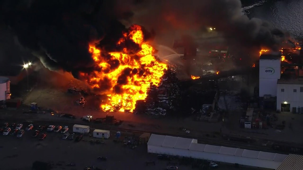 Massive junkyard fire rages in Camden