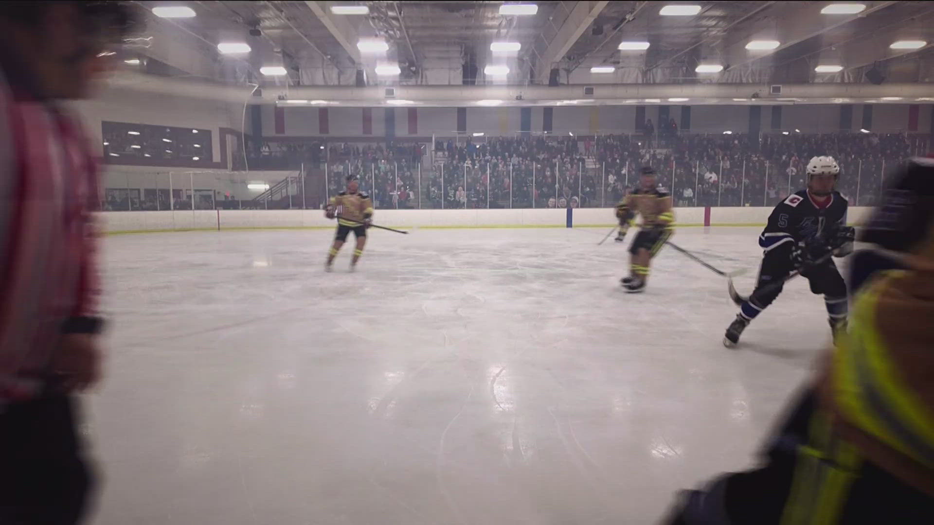 Friendly rivalry during charity hockey game among MN first responders
