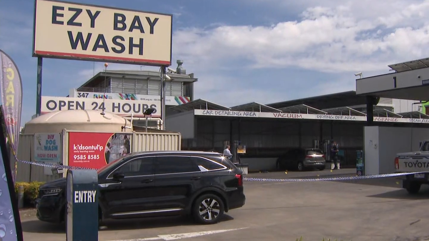 Woman's hand slashed in random knife attack at Melbourne car wash