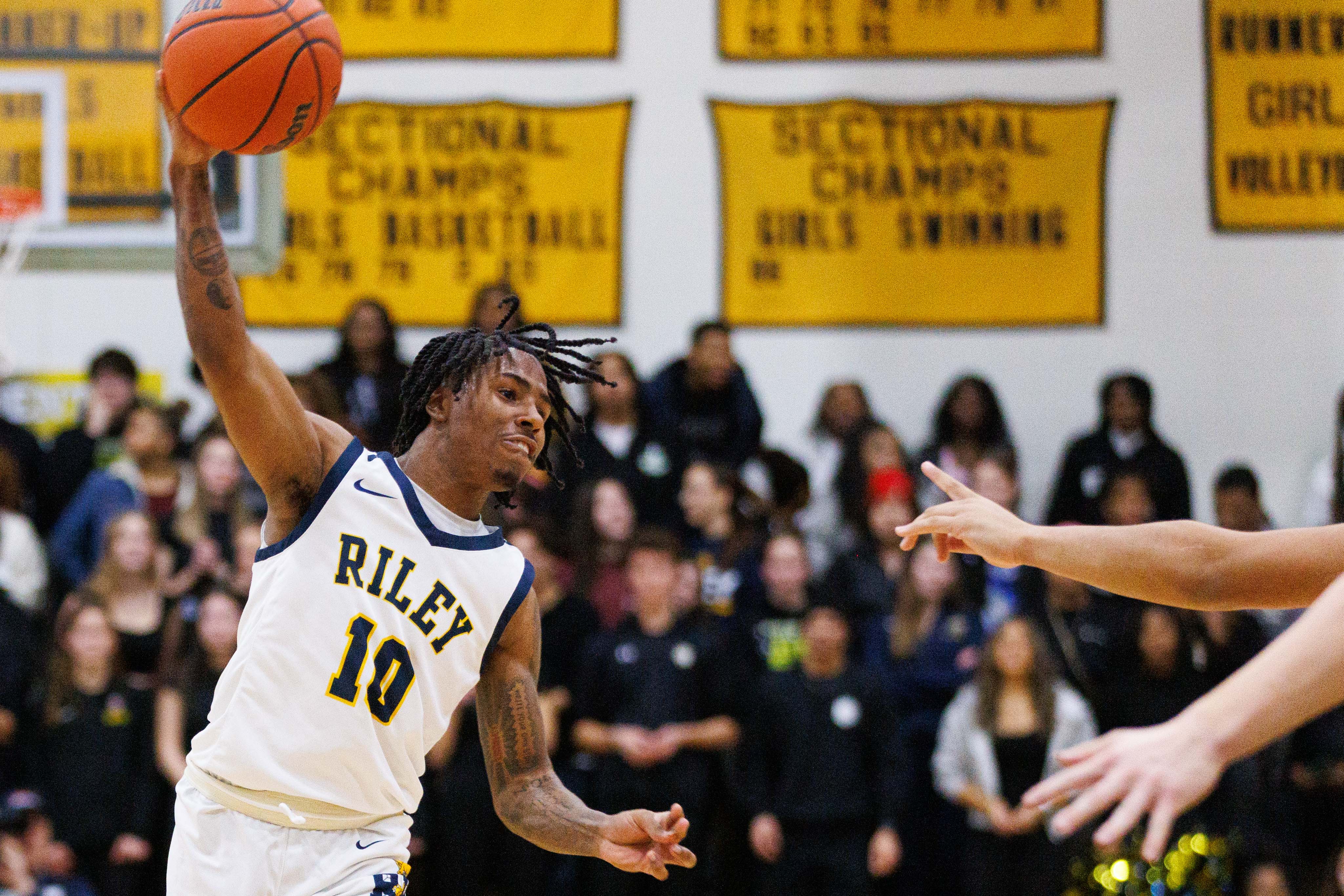 South Bend Riley boys basketball roars past Penn to claim NIC championship