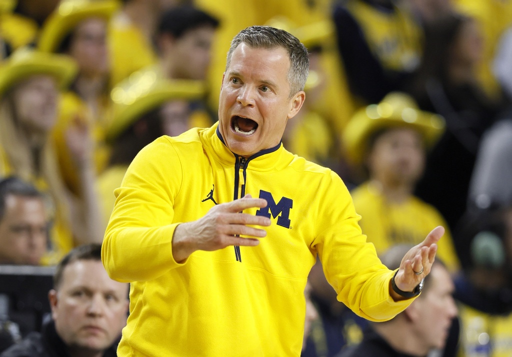 Michigan agrees to multiyear contract extension with coach Dusty May ...