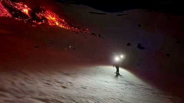 Daredevils ski on erupting volcano as hot lava bubbles nearby