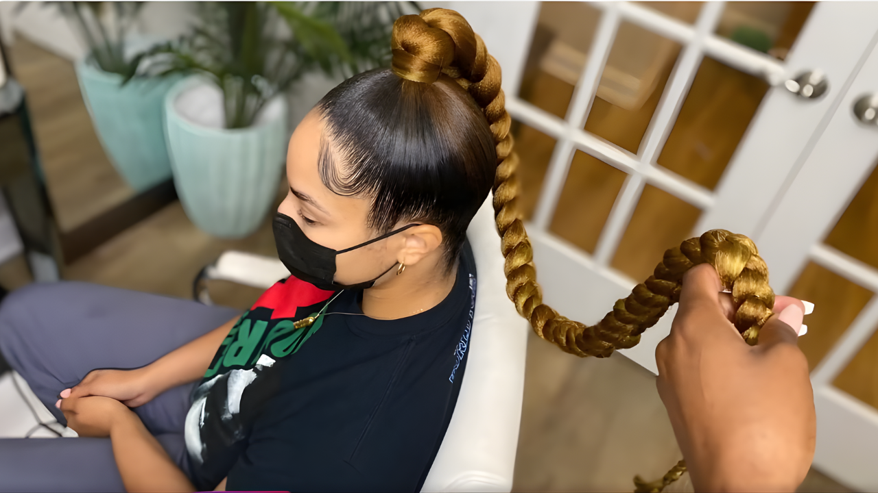 Braided sleek ponytail with a pop of color: the quick style everyone loves