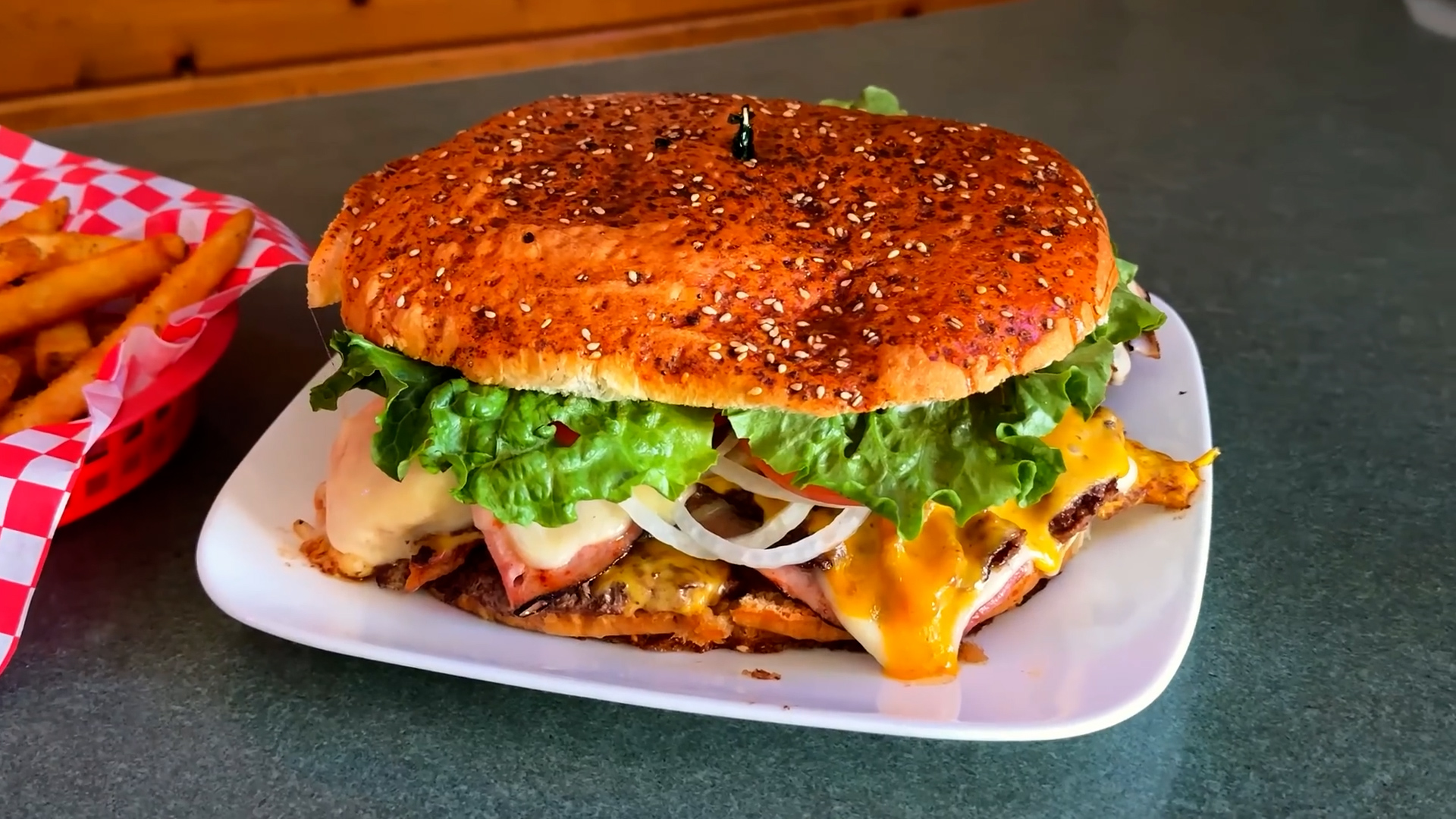 The owner bet me $1000 to double this burger challenge