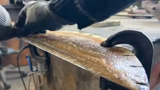 Knife maker unveils a chainsaw-inspired blade in an unusual workshop build
