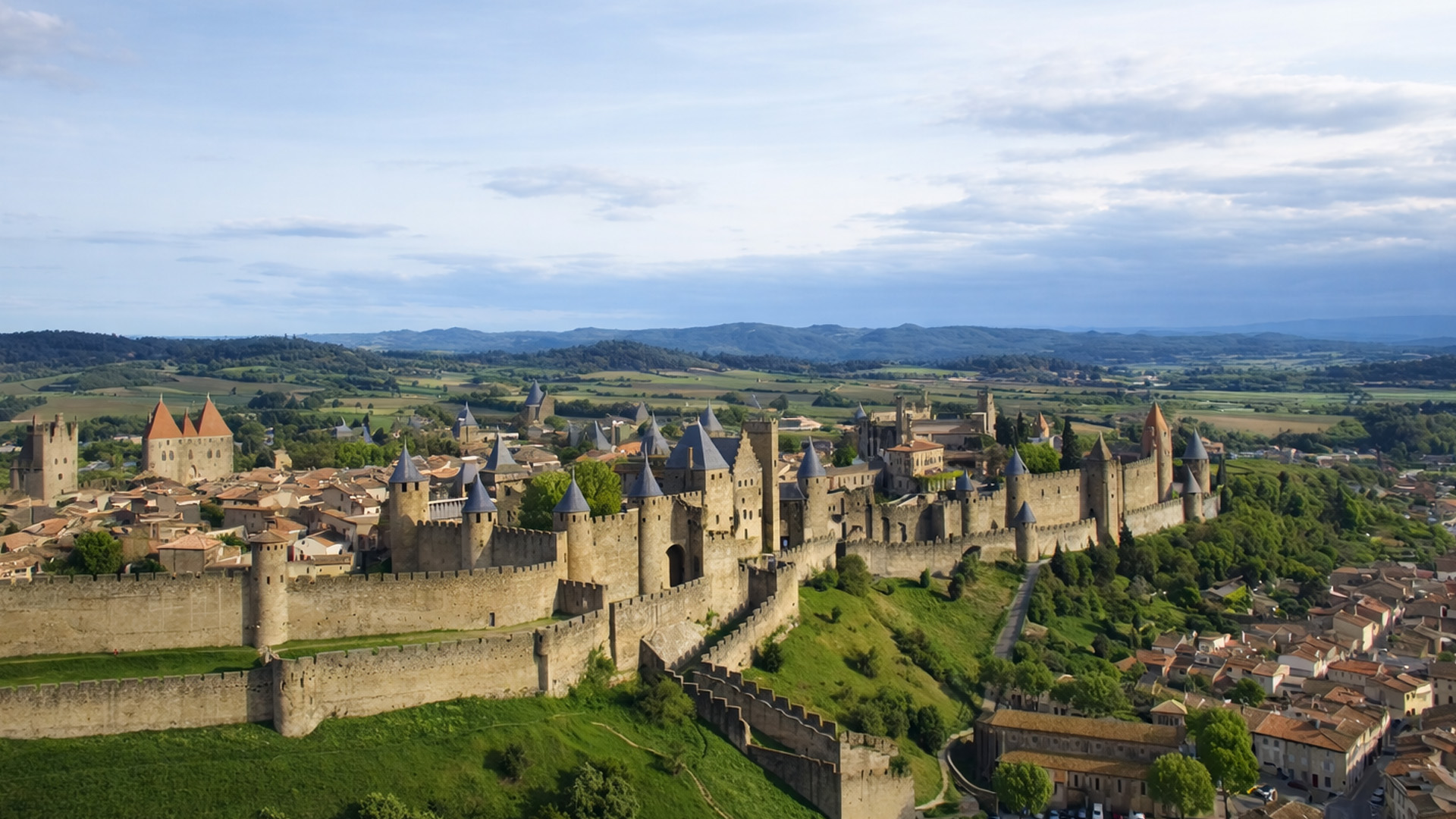 A city protected by layers of stone walls