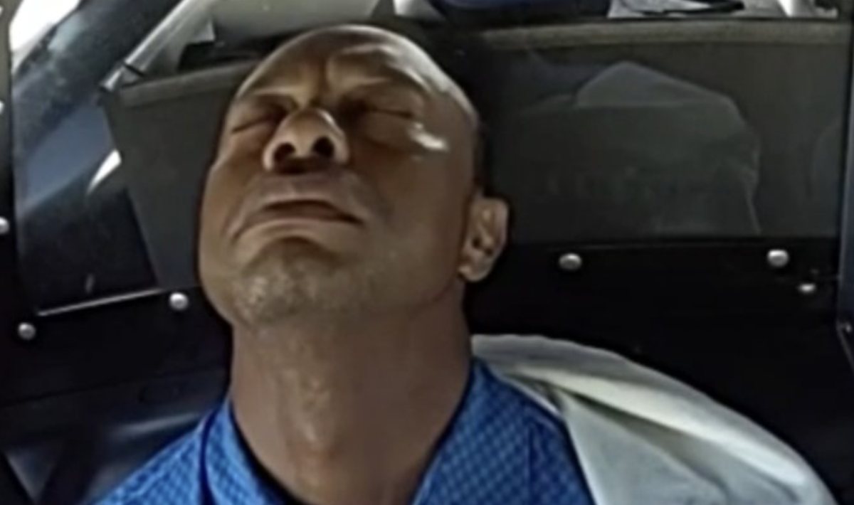 Photos of Tiger Woods in backseat of police car are tough to look at