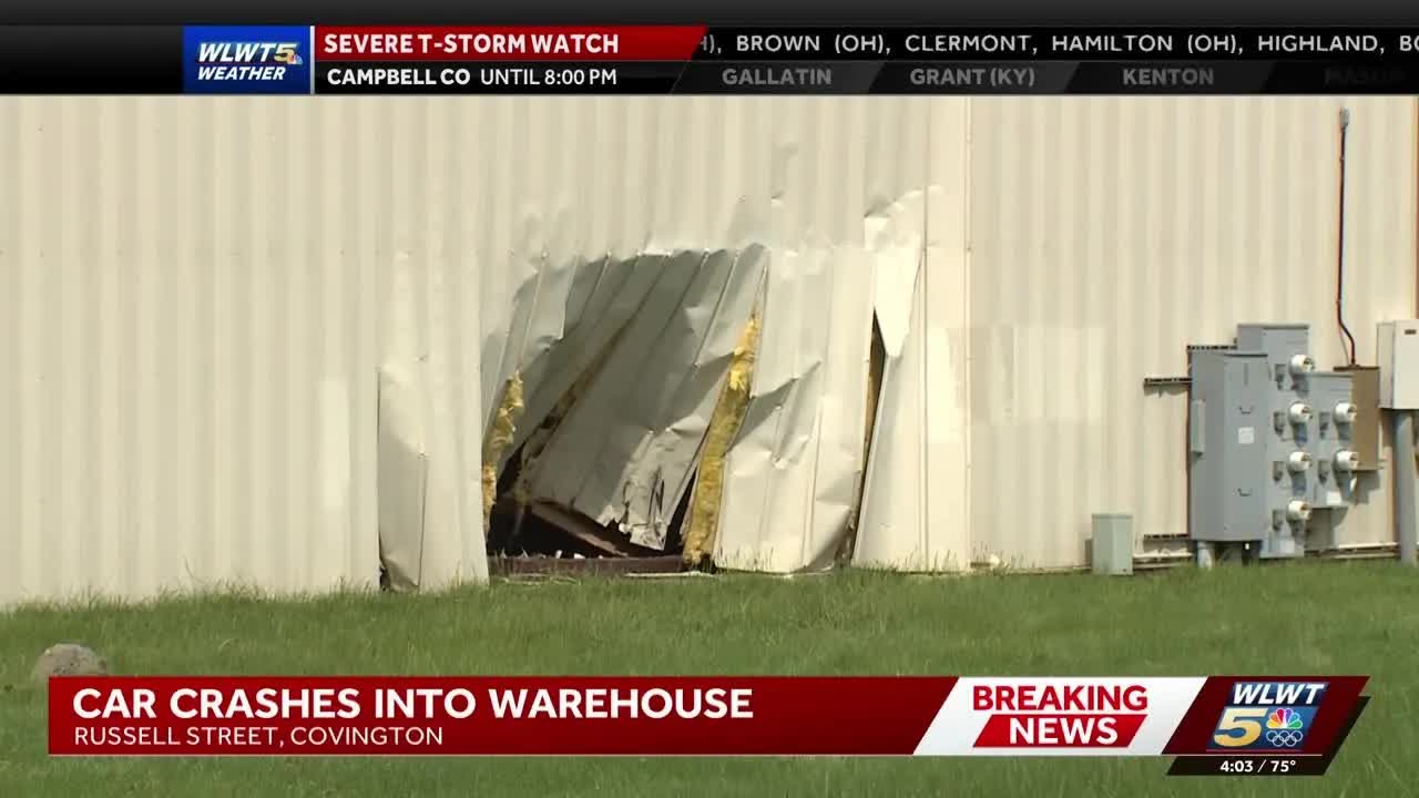 Car crashes into Covington warehouse, leaving damage to building