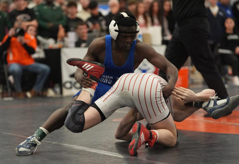 Incredible journey of Long Island wrestling champ who overcame horrific ...