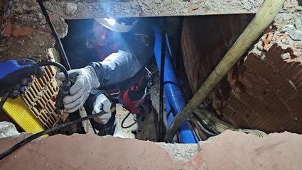 Underground drug-smuggling tunnel with rail system and cranes uncovered ...