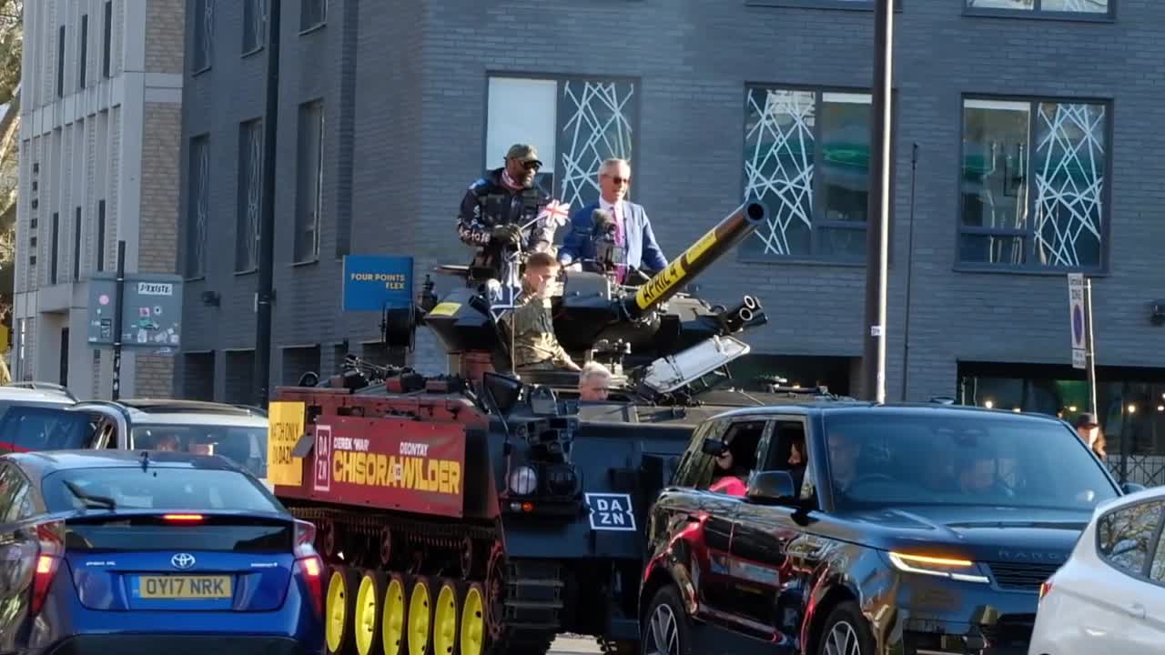 Bizarre scenes as heavyweight boxer Derek Chisora and Nigel Farage ride ...