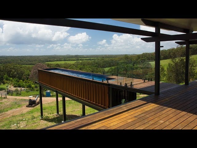 Modern home with a shipping container pool
