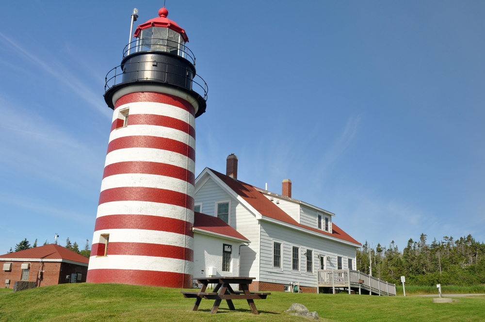 America’s first sunrise hits a candy-striped lighthouse in this ...