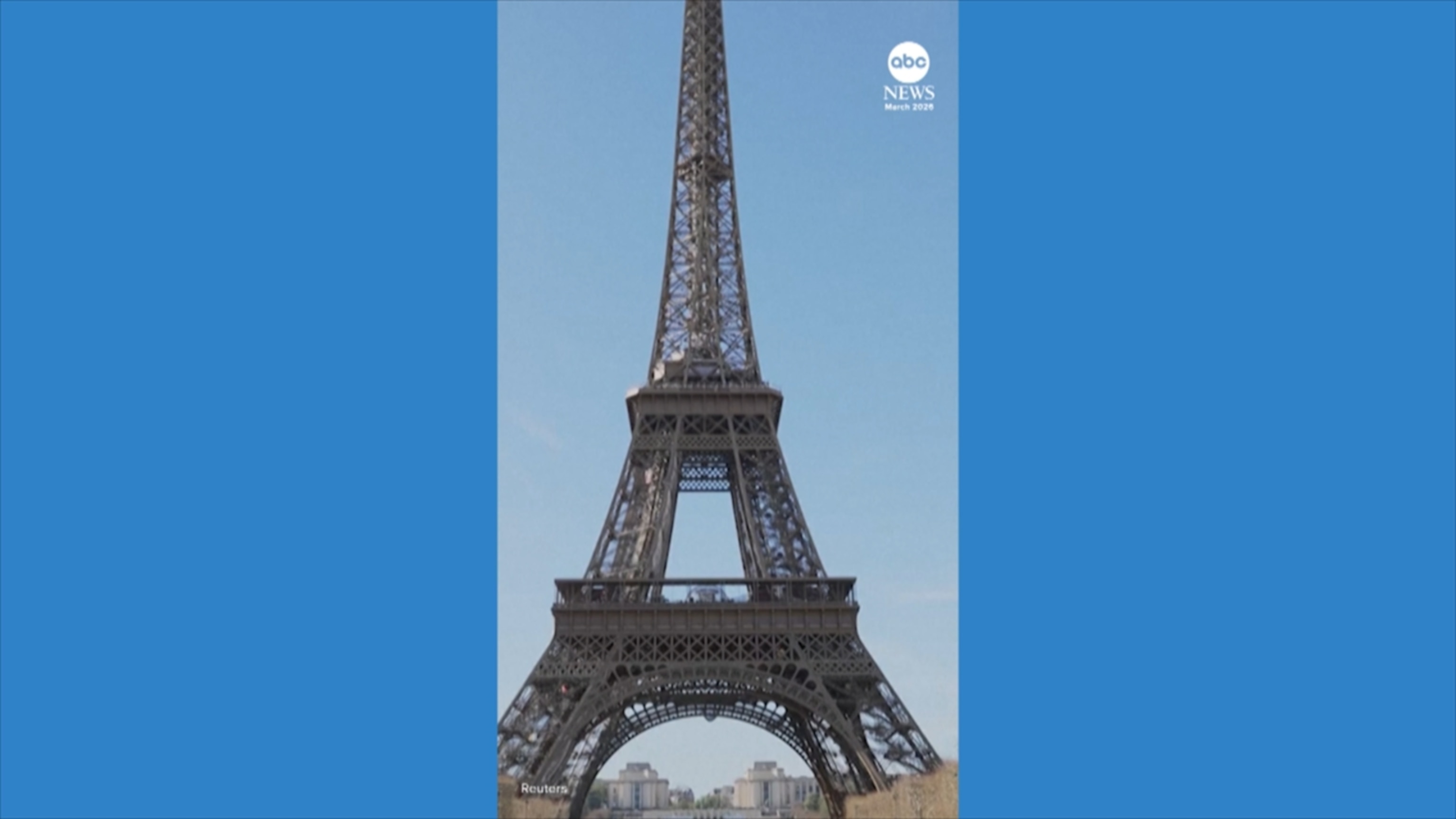 Tourists brave rope bridge suspended from Eiffel Tower