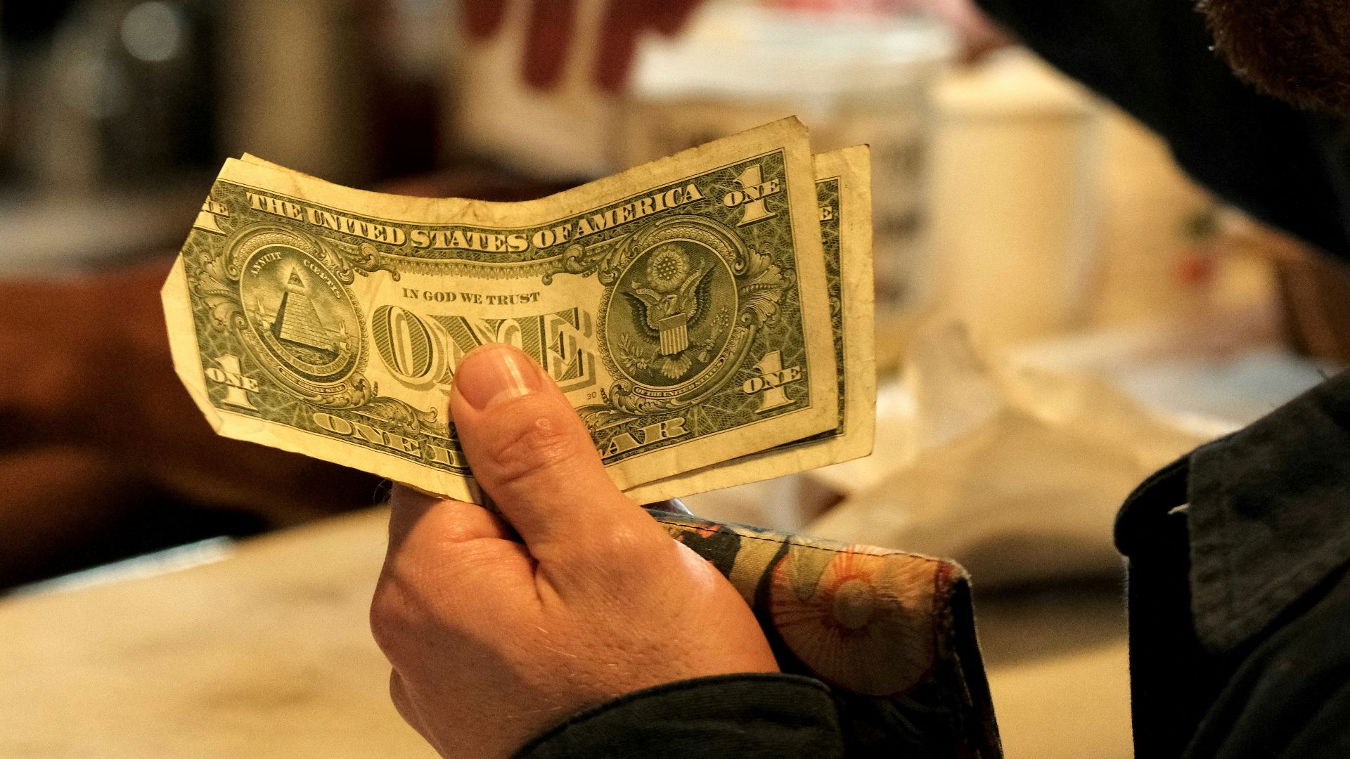 My employer pays me in tips, but they’re taking a cut. Is that allowed?