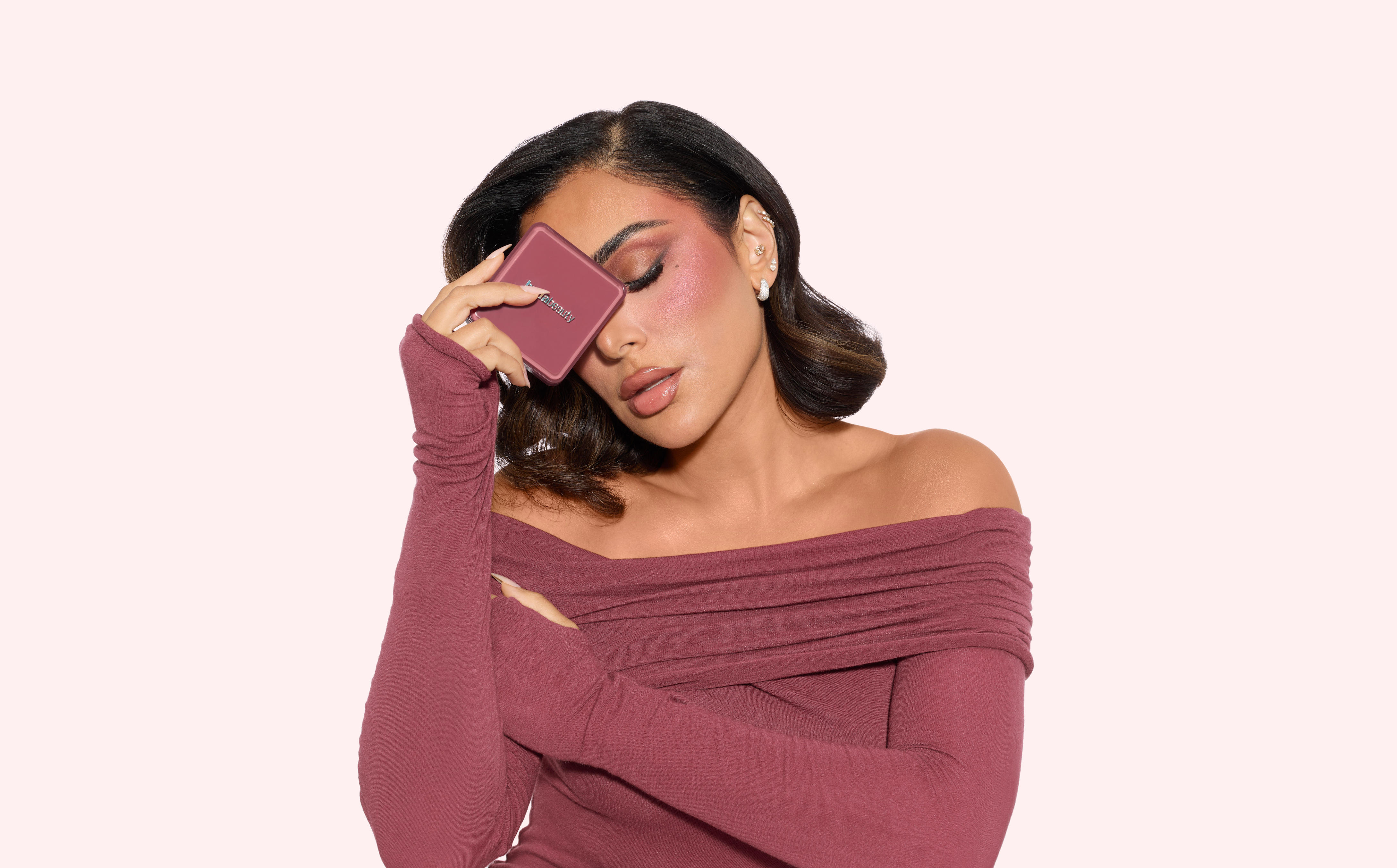 Huda Beauty's new collection reimagines Y2K beauty for a new generation