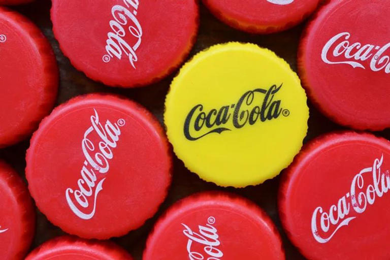 Coca-Cola bottles now have yellow caps and here's why people are ...