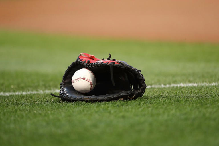 Baseball player's wild home run bounces off opponent's head
