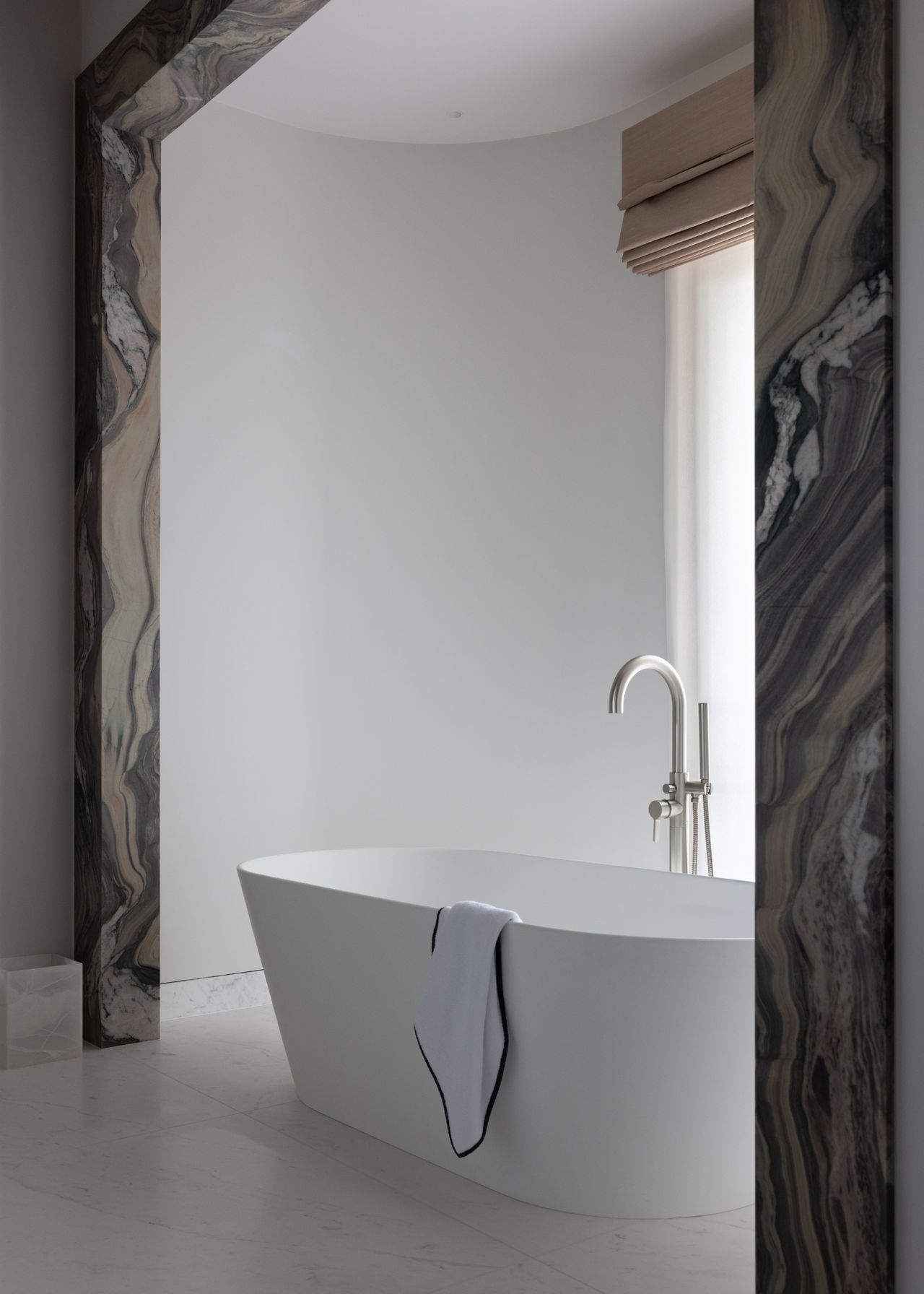 The marble architrave trend makes your bathroom look expensive