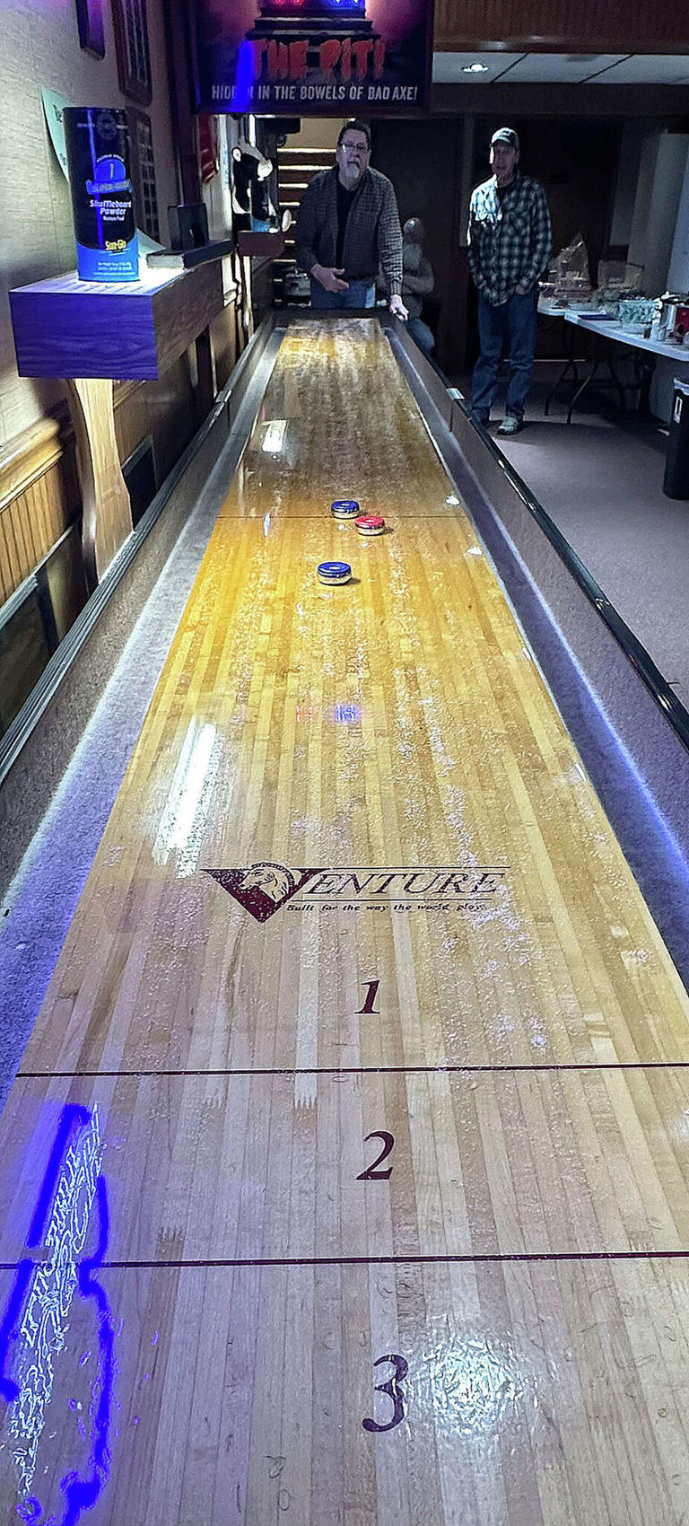 Bad Axe shuffleboard league keeps camaraderie alive at Pete’s Bar