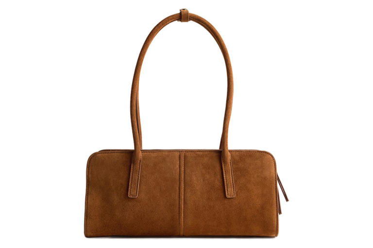 Eyeing an East-West bag for spring? Shoppers compare this Quince clutch ...