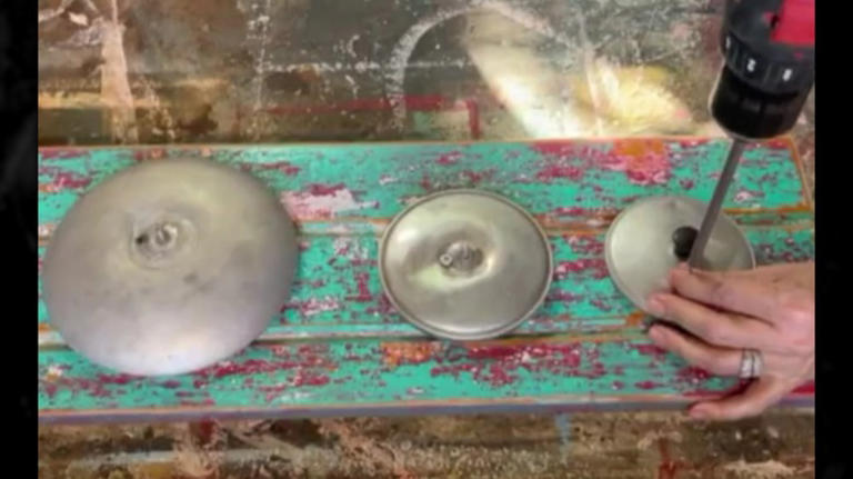 Upcycle an old pot lid into a rustic storage rack