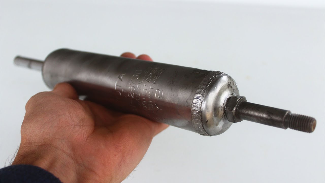 EXCELLENT home made FROM AN OLD SHOCK ABSORBER!!! do it yourself ...