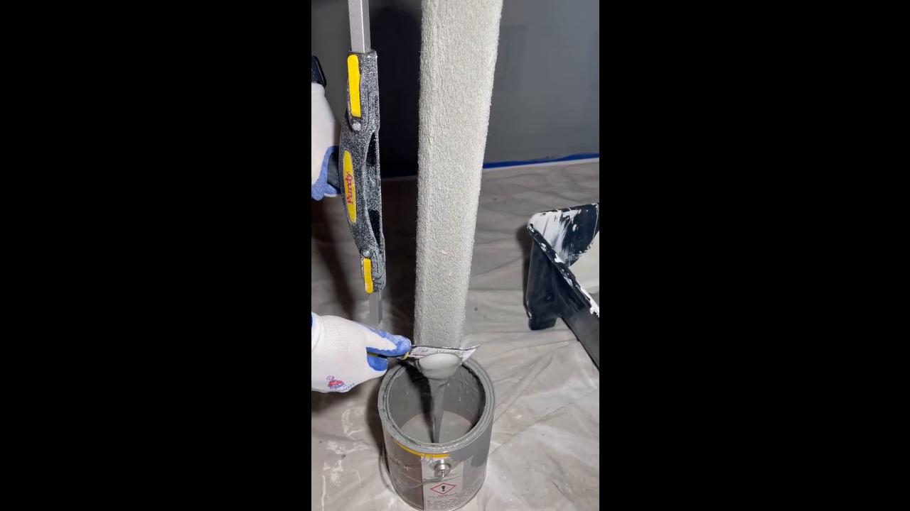 Cleaning paint roller with scraper tool