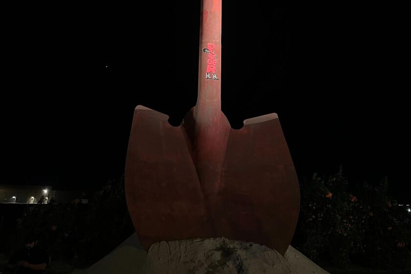 Why is there a giant shovel in the desert outside Coachella? Tom Cruise ...