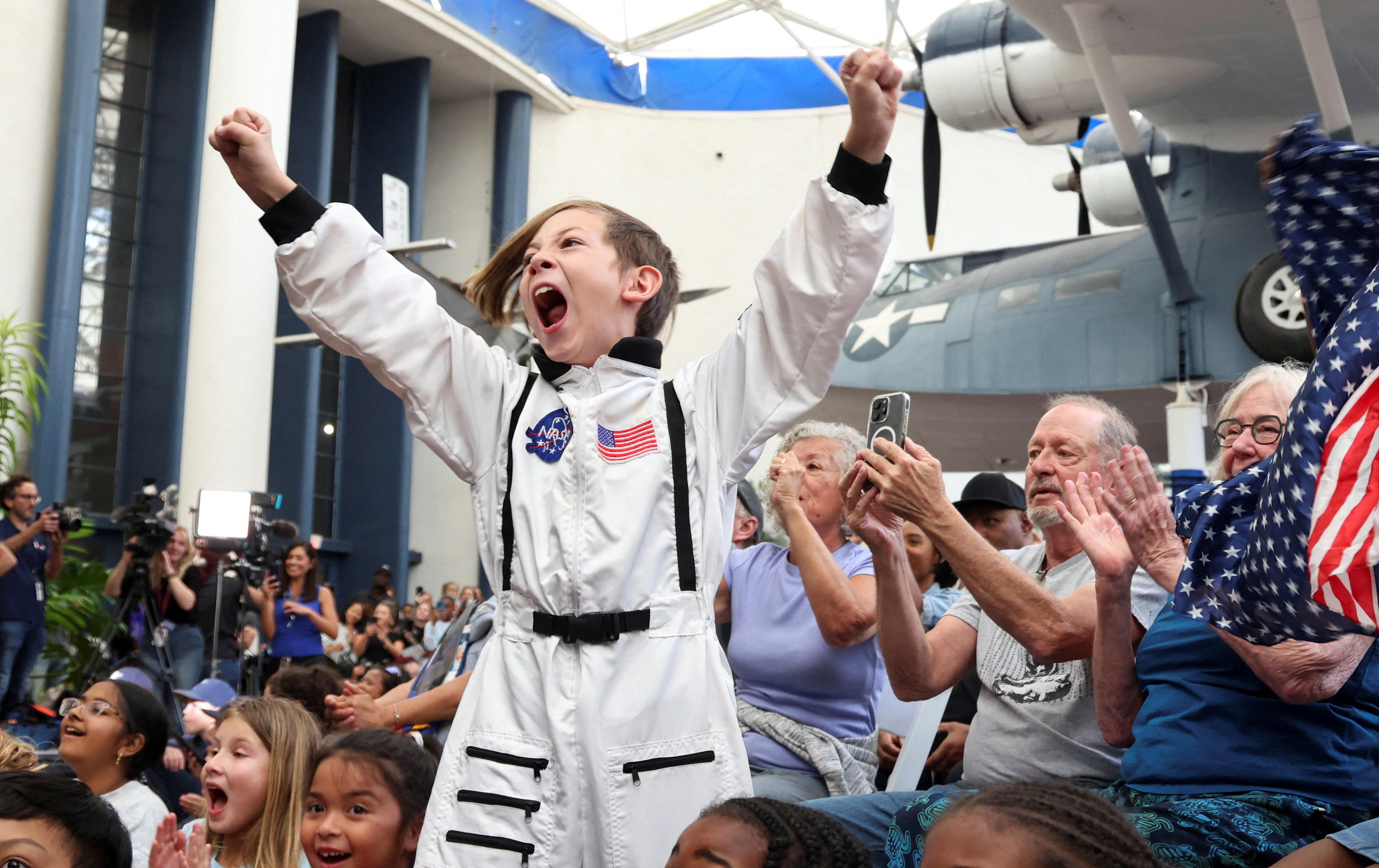 From liftoff to splashdown: The historic space mission that united America