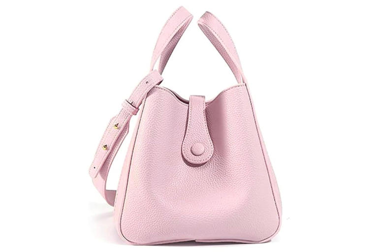 This quilted bag looks like it belongs behind glass in a Chanel ...