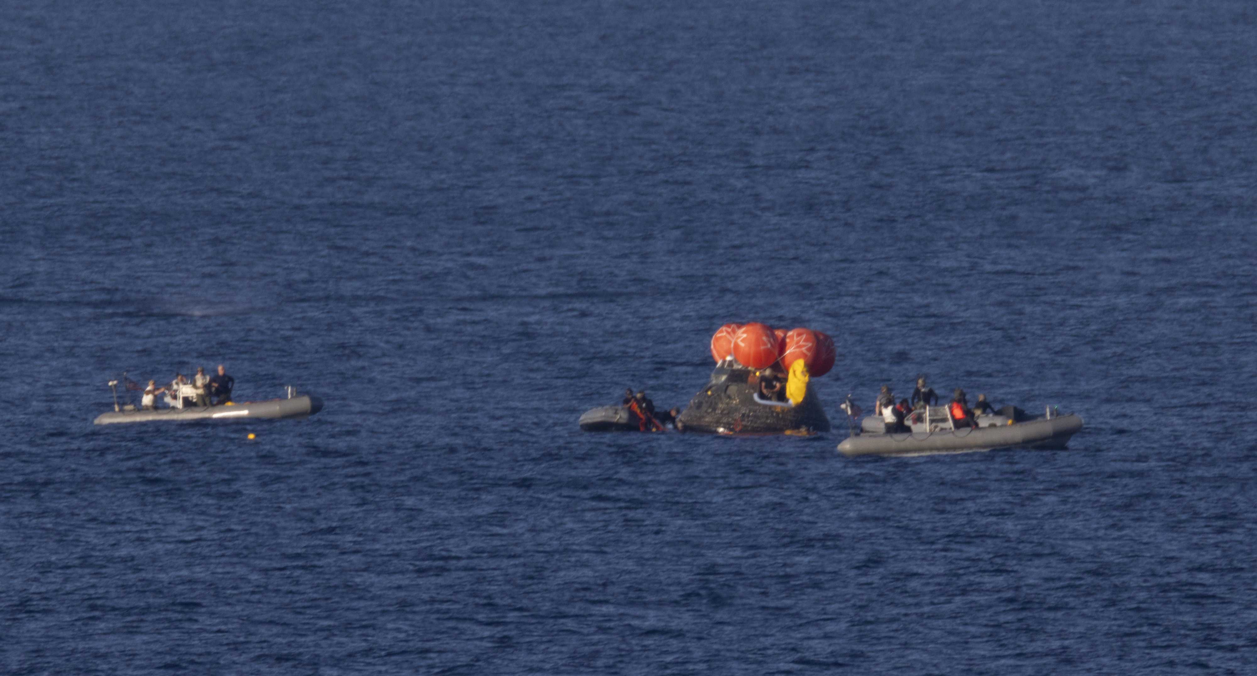 Watch Artemis II astronauts emerge from moon capsule after returning to ...